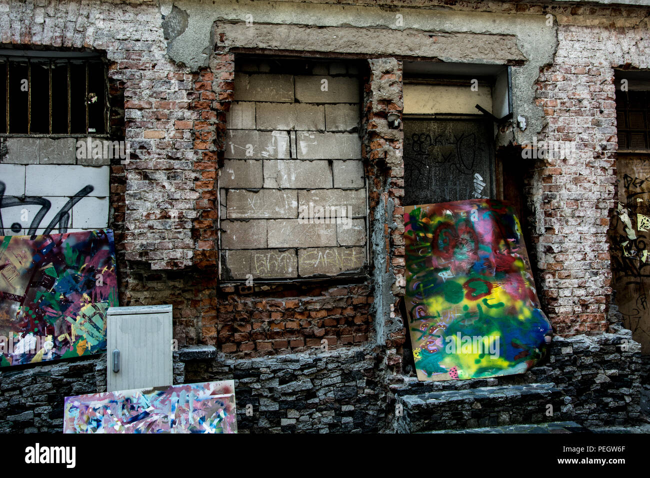 Gloomy and colorful construction site in the alley Stock Photo - Alamy