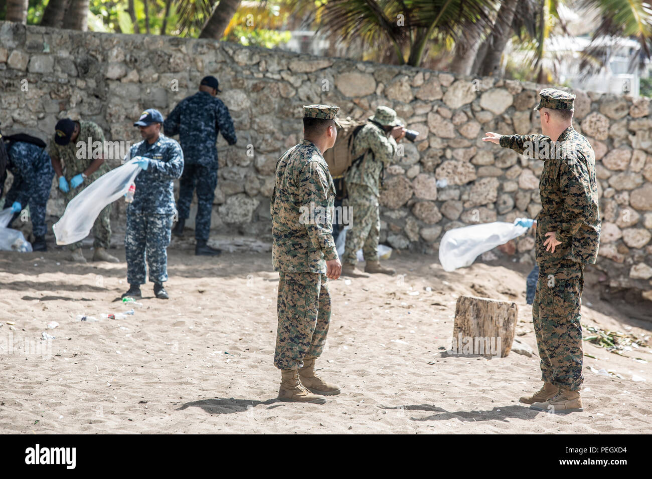 U.S. Marines assigned to 4th Civil Affairs Group supervise and ...