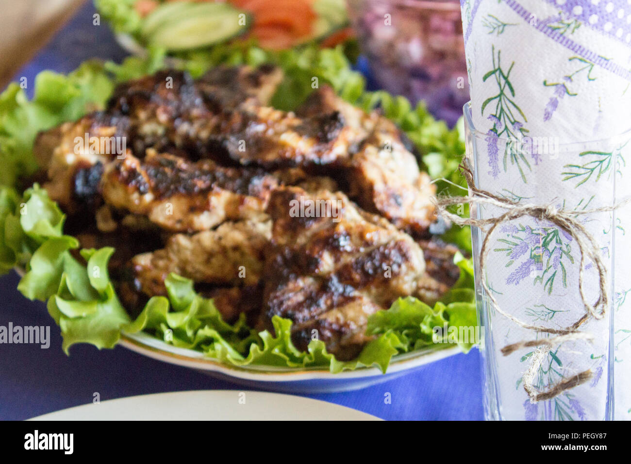 Festive table setting. Barbecue, grilled meat. food Stock Photo - Alamy