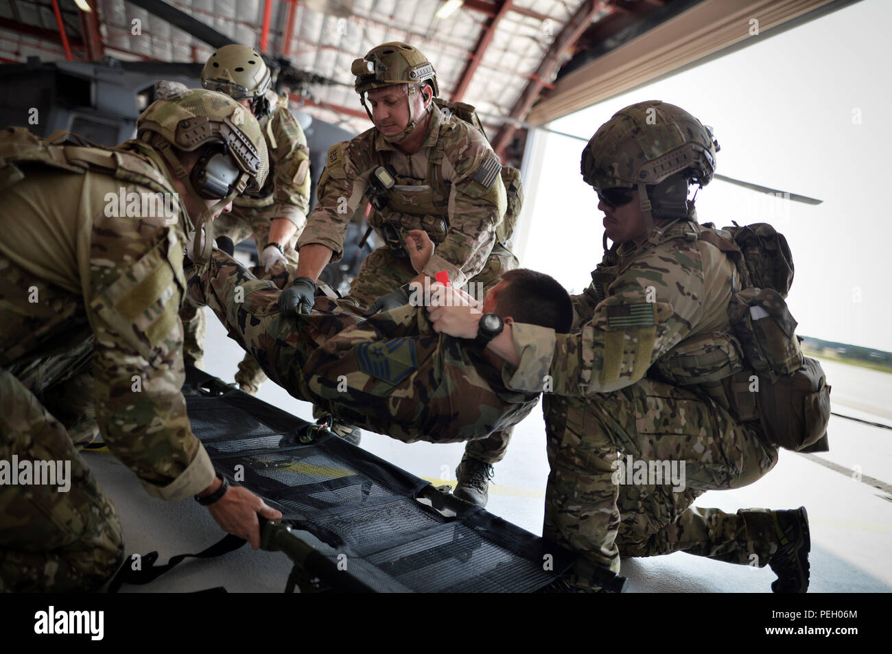 Pararescue jumpers and combat rescue officers with the 103rd Rescue ...
