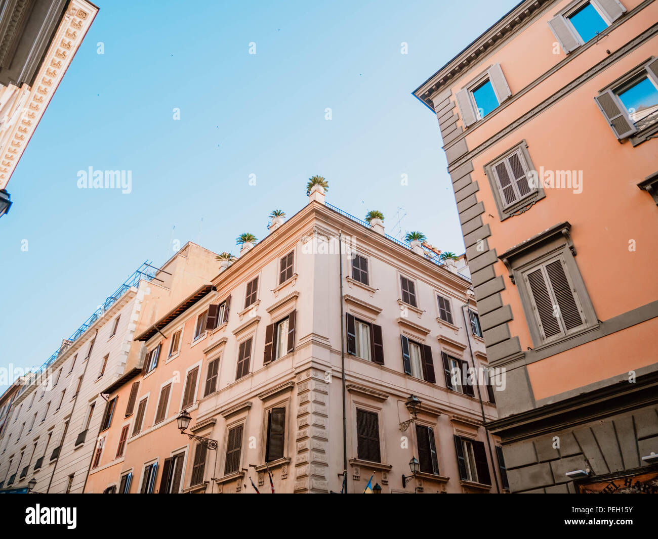 Beautiful facade of apartment building in Rome, Italy. Windows with ...