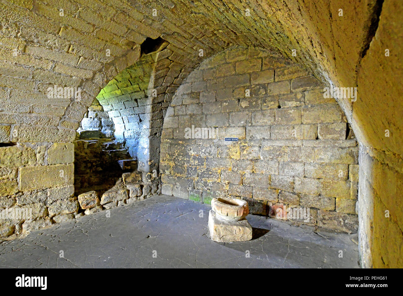 English Heritage Warkworth Castle guardroom Stock Photo - Alamy