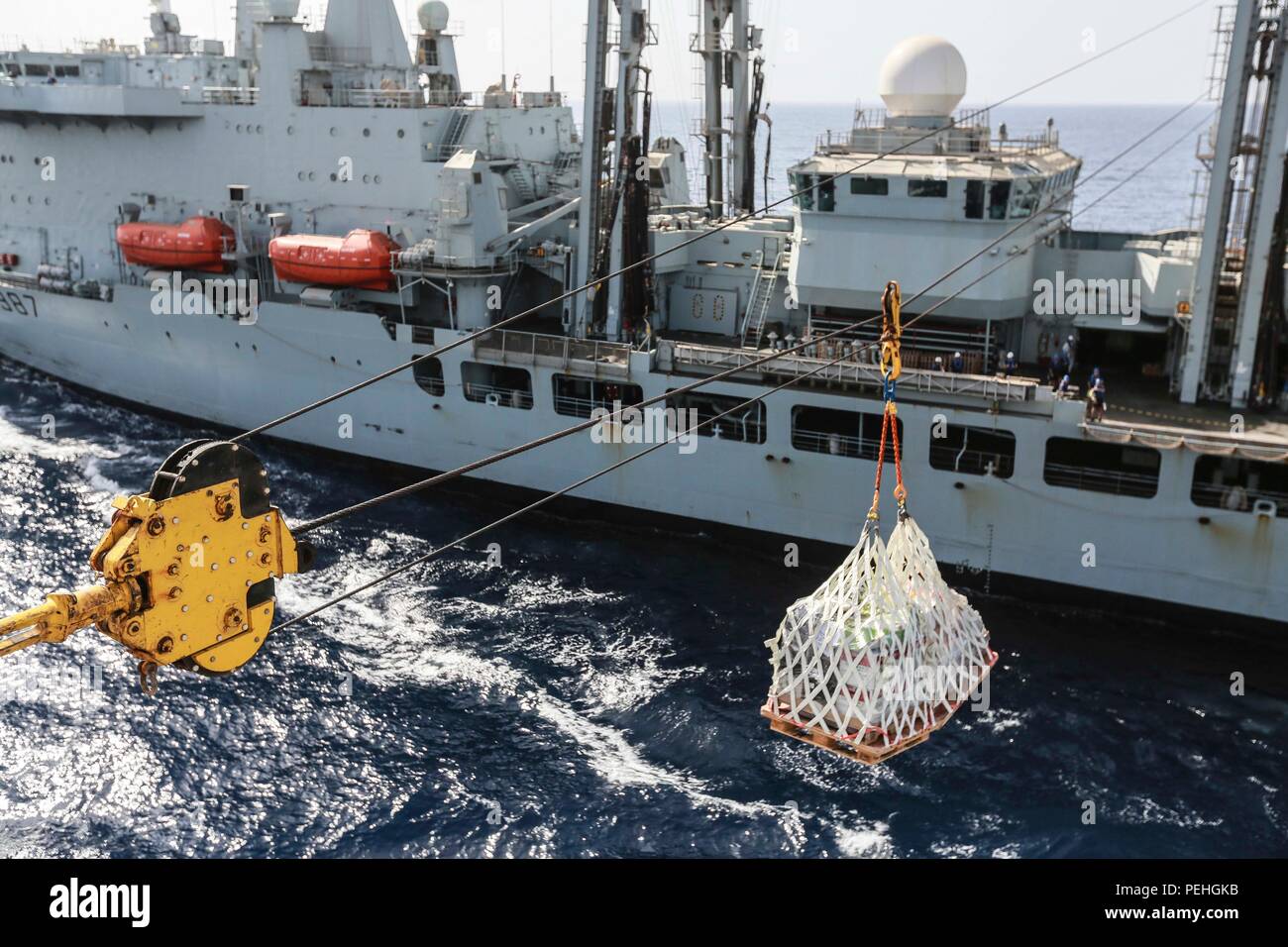 RFA Fort Victoria (A387) delivered supplies to USS Anchorage (LPD 23 ...