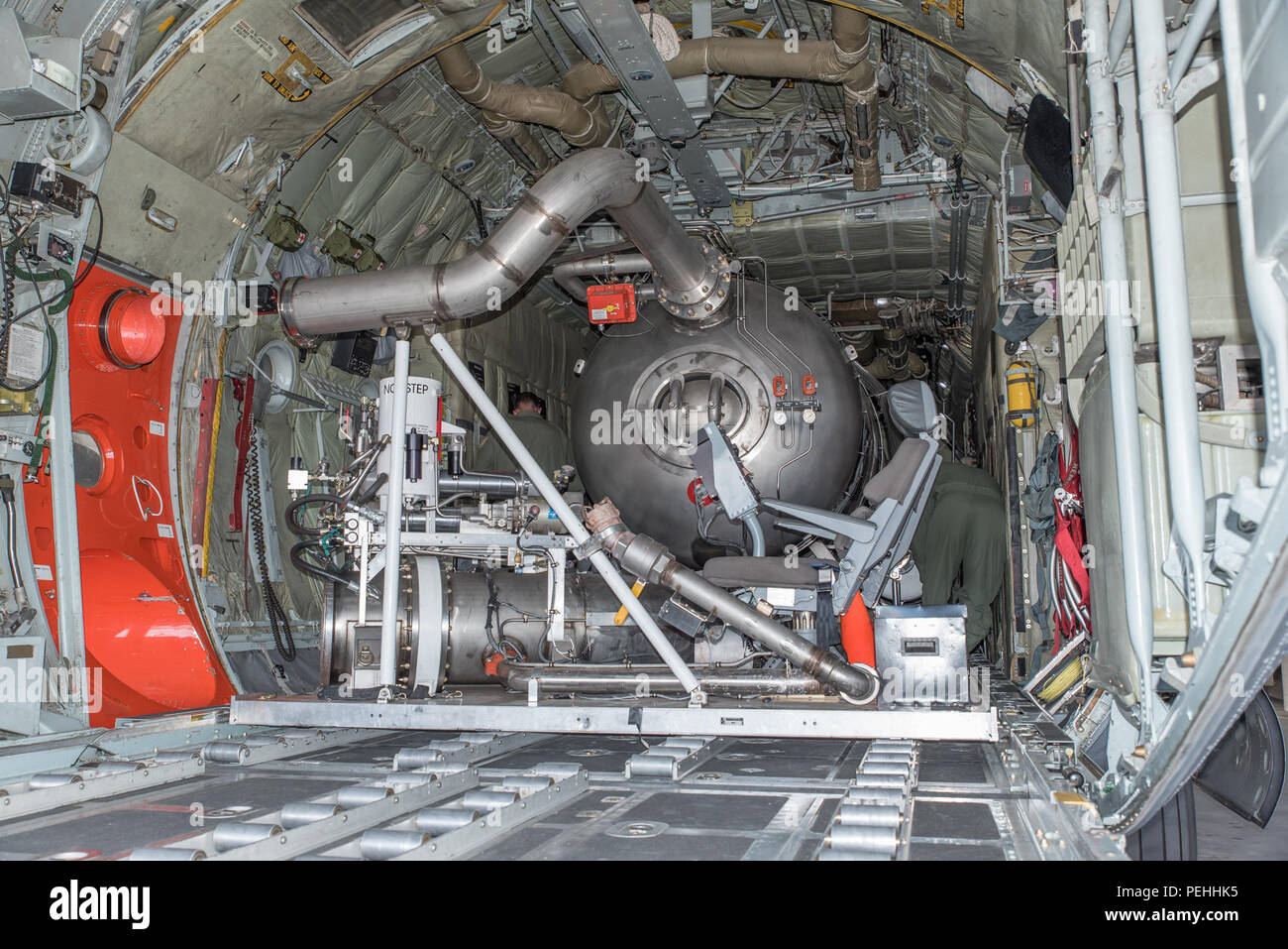 A Modular Airborne Fire Fighting System (MAFFS II) sits onboard a C ...