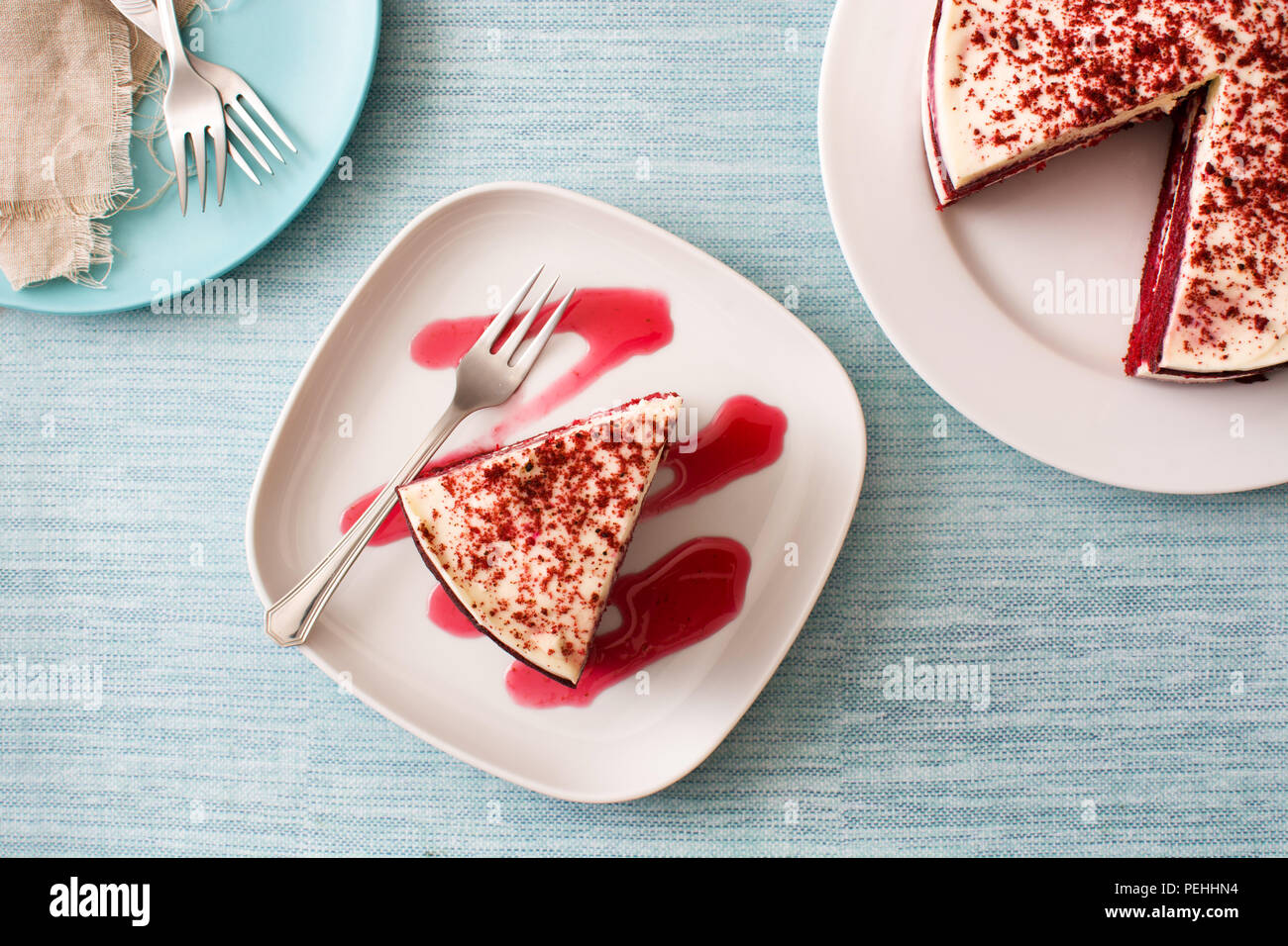 Red Velvet cake slice on blue background. Top view Stock Photo - Alamy