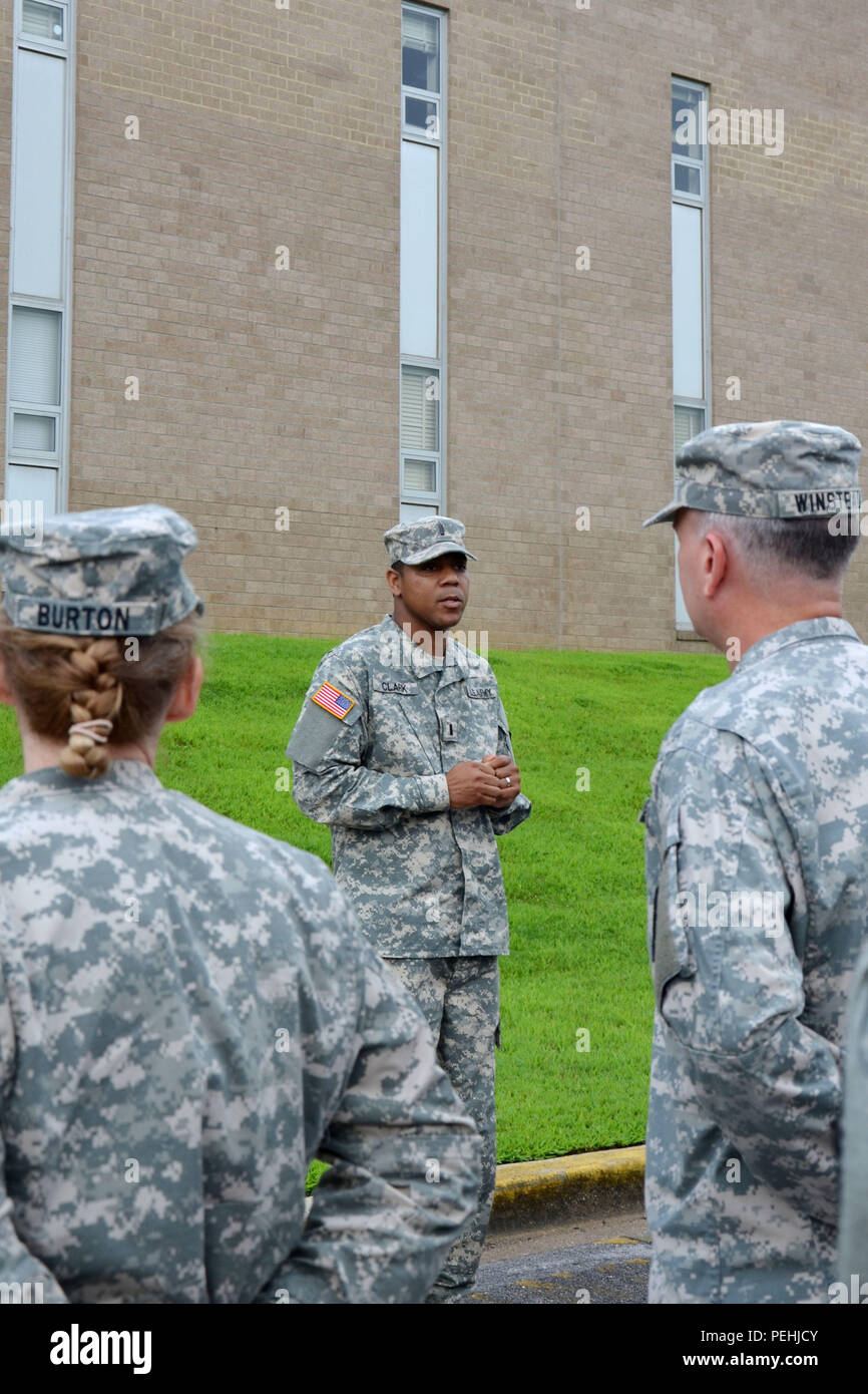 First Lt. Andre Clark looks on as the incoming commander for the ...