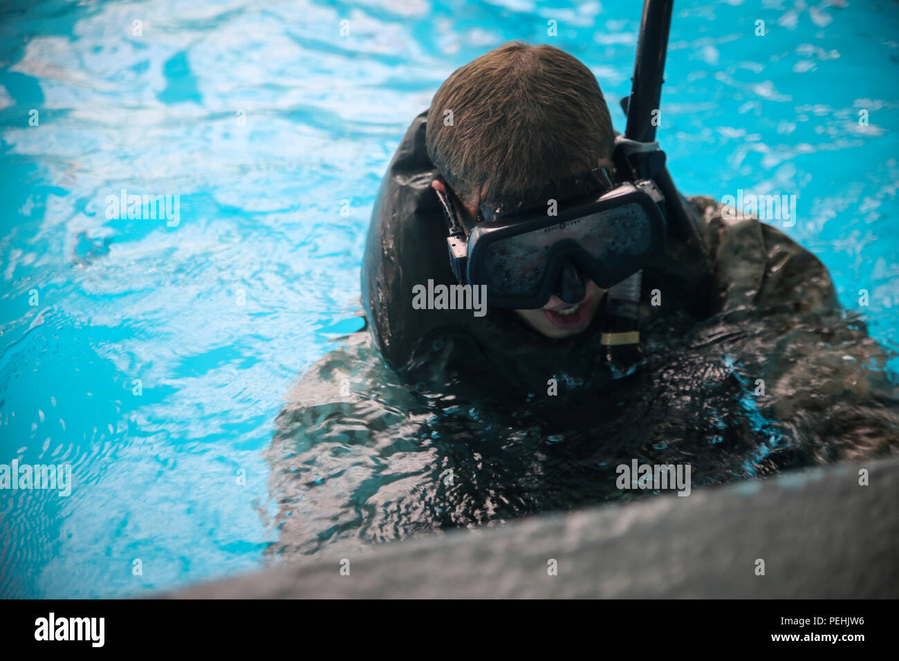 A Marine with 2nd Reconnaissance Battalion completes his third lap in a ...