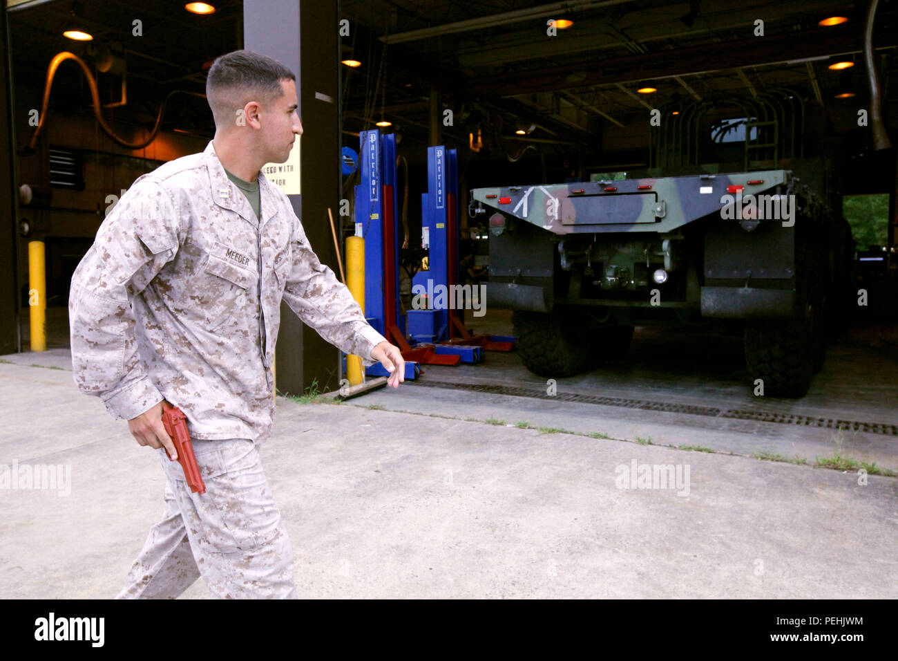 Capt. Eric Meeder role-plays as an active shooter during an anti ...