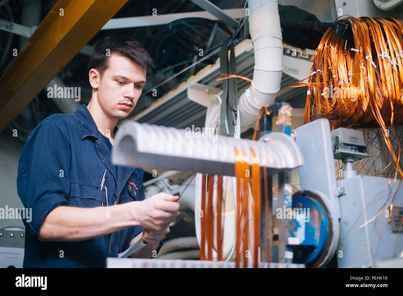 ARABIAN GULF (Aug. 24, 2015) Electrician's Mate 3rd Class John Cannon ...