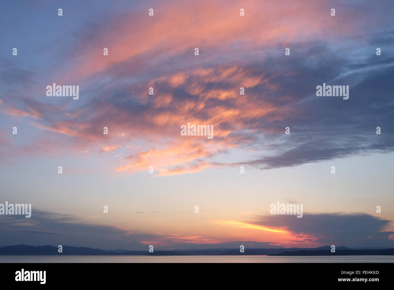 Beautiful sunrise in sea with dramatic clouds background Stock Photo ...