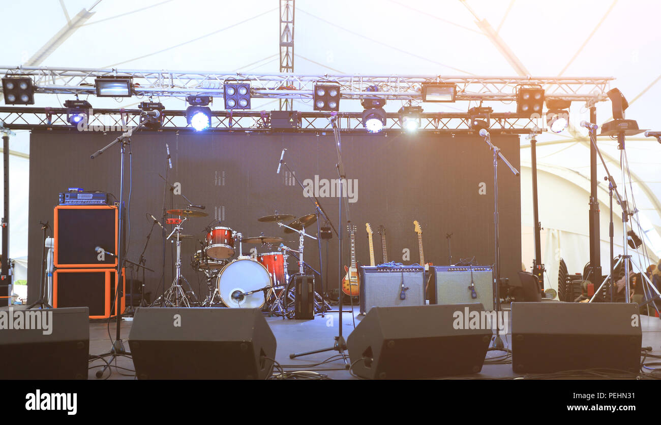 An empty Stage Before the Concert with floodlight, musical instruments ...
