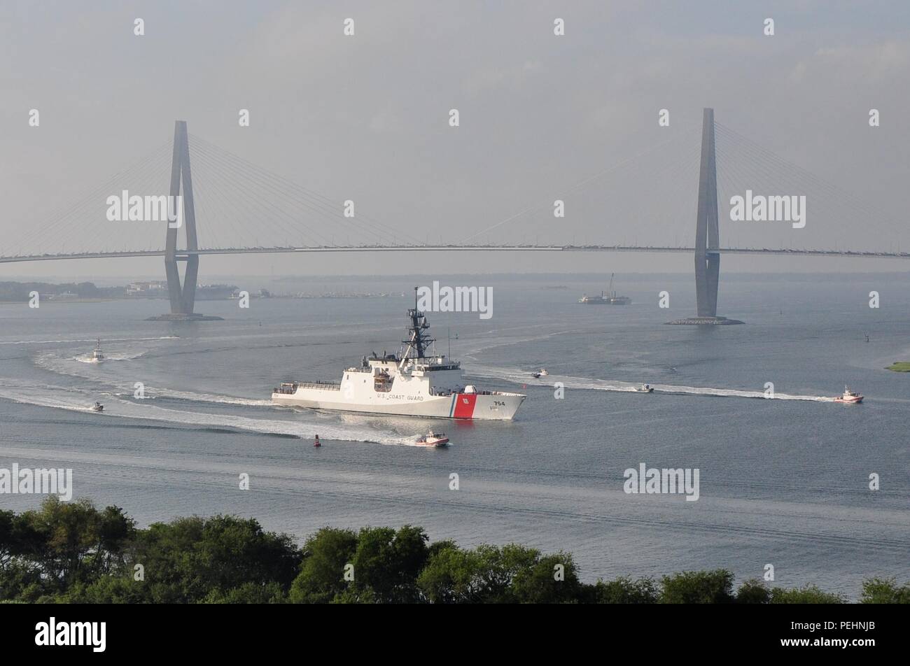 The U.S. Coast Guard Cutter James transits under the Ravenel Bridge in ...