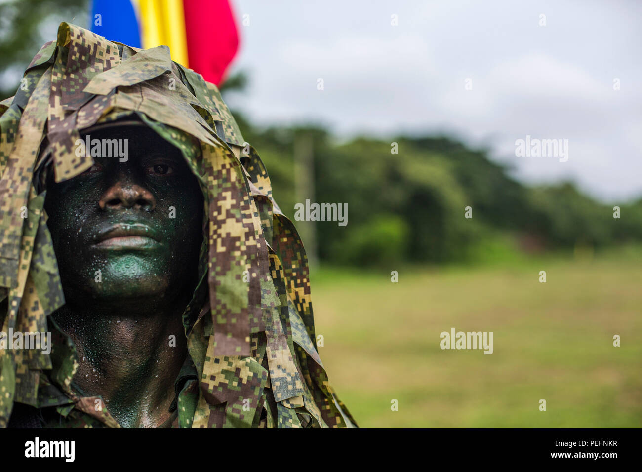 A scout sniper with the Infantería de Marina de Colombia poses for a ...
