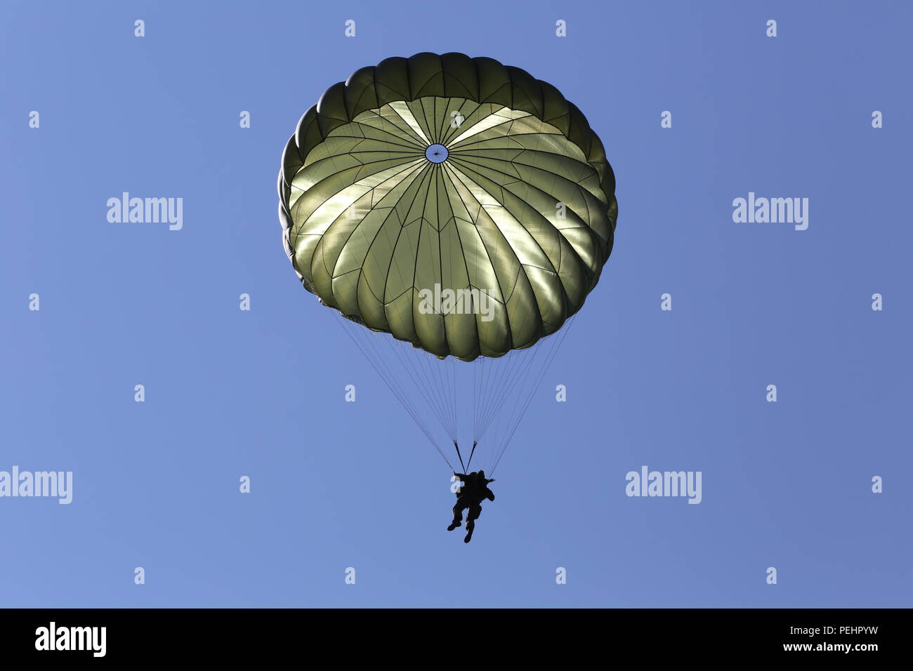 An Italian soldier parachutes into the Hohenburg drop zone while ...