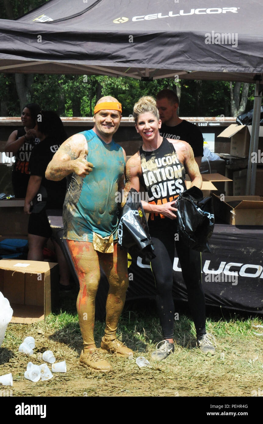 Capt. Sean Demauri celebrates finishing the Tough Mudder with a member ...