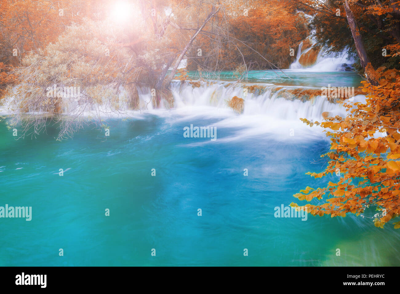 Beautiful fall colors forest waterfall and lake. Plitvice National Park ...