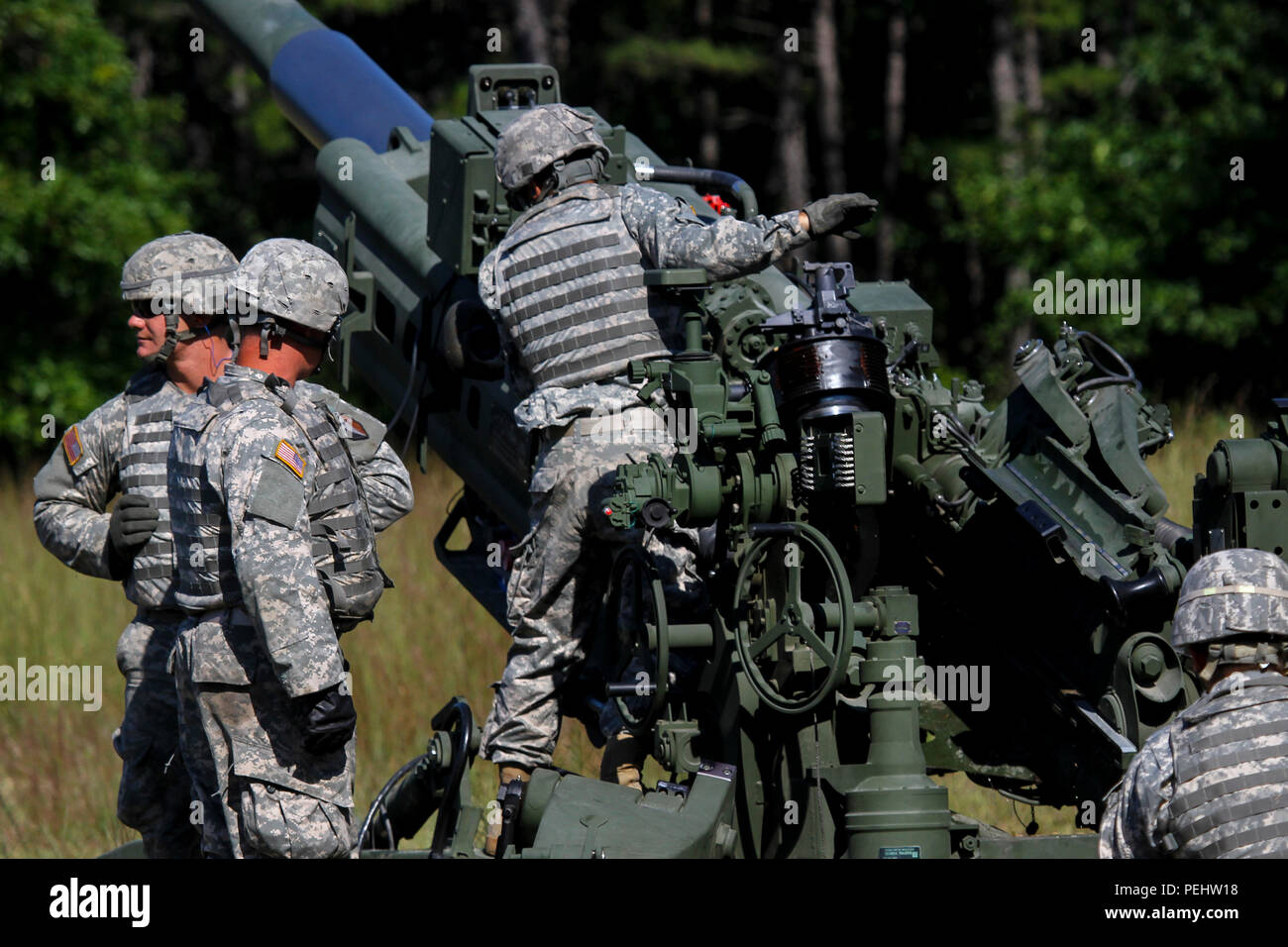 Soldiers from the New Jersey Army National Guard's 3-112th Field Artillery live-fire new M777A2 ...
