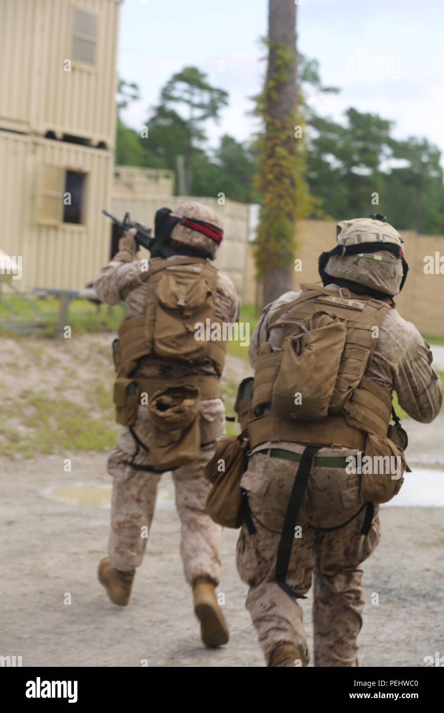 Marines with Fox Company, 2nd Battalion, 2nd Marine Regiment, cross the ...