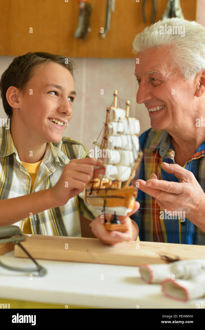 Portrait of a boy with model of plane Stock Photo - Alamy