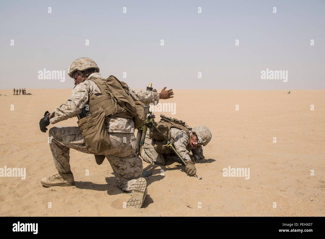 KUWAIT (Aug. 26, 2015) U.S. Marines Lance Cpl. Maurice Gardner, left ...