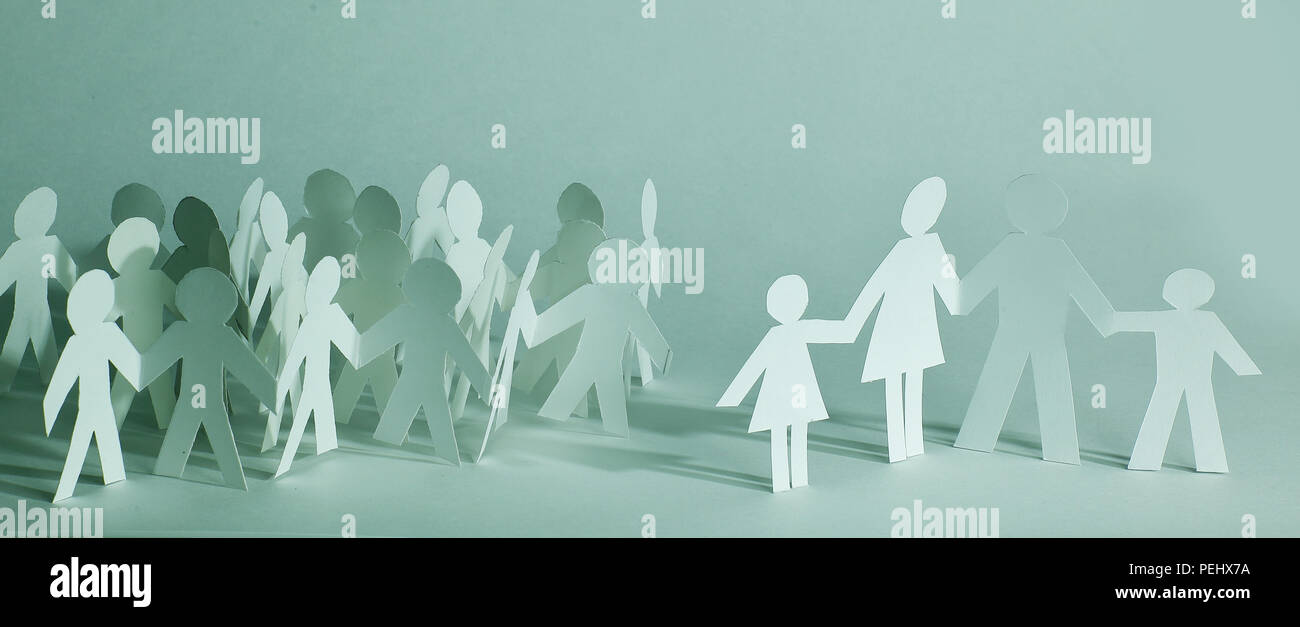 many paper men on the paper background Stock Photo - Alamy