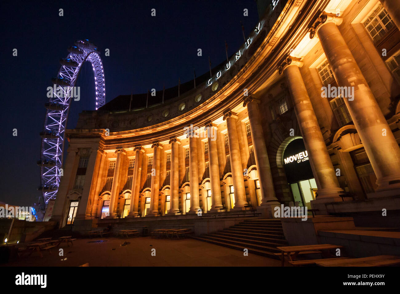 County Hall and London Eye at Night Stock Photo - Alamy