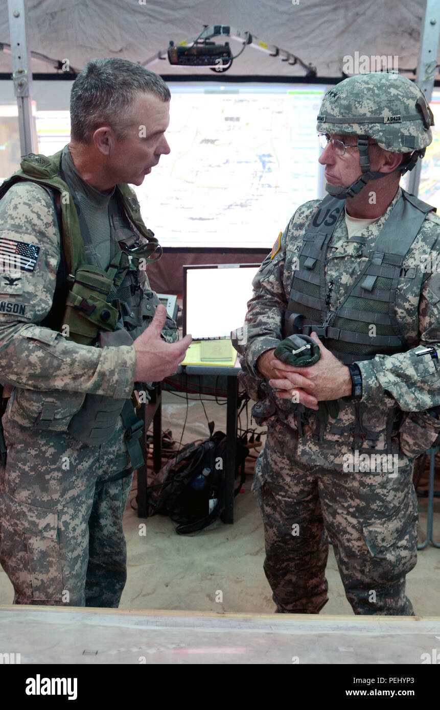 Idaho Army National Guard Col. Russell D. Johnson (left), commander of ...