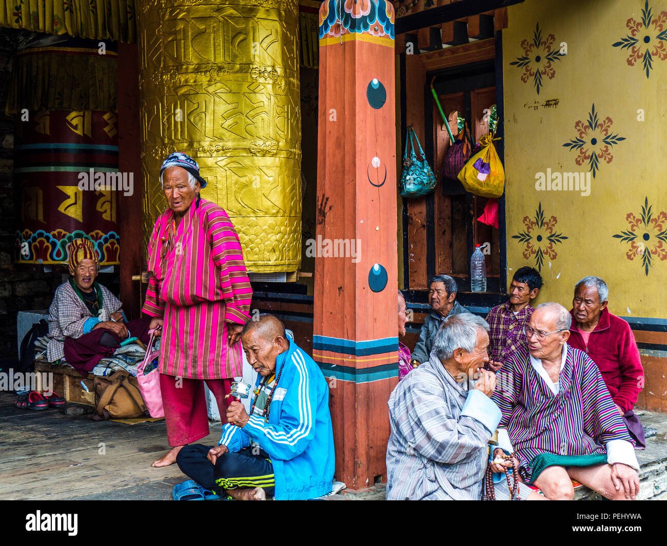Local Bhutanese people worshipping in a Buddhist temple in Bhutan Stock ...