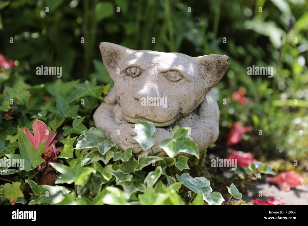 gothic stone gargoyle garden ornament Stock Photo - Alamy