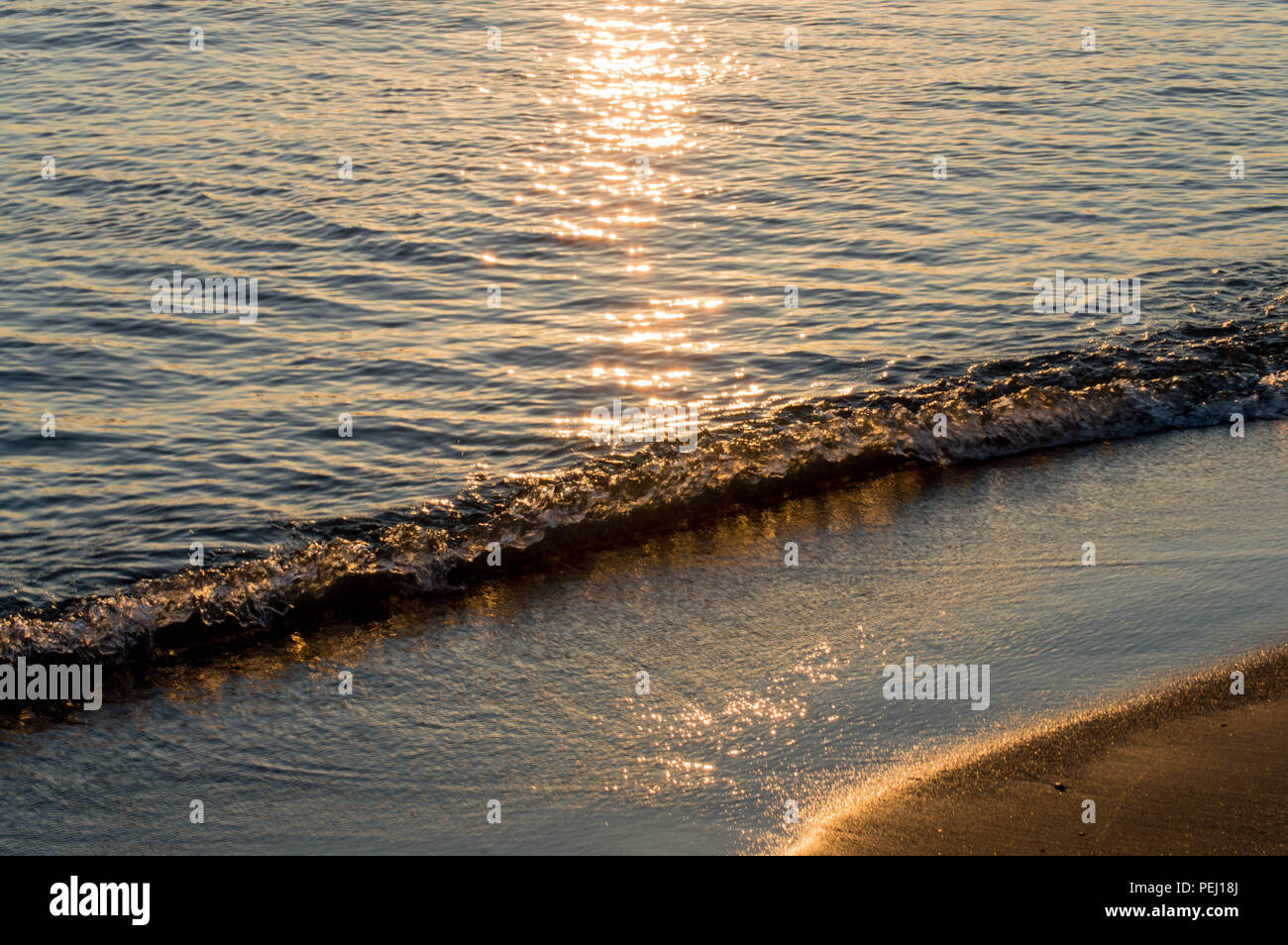 Greek Summer at Saronida beach Stock Photo - Alamy