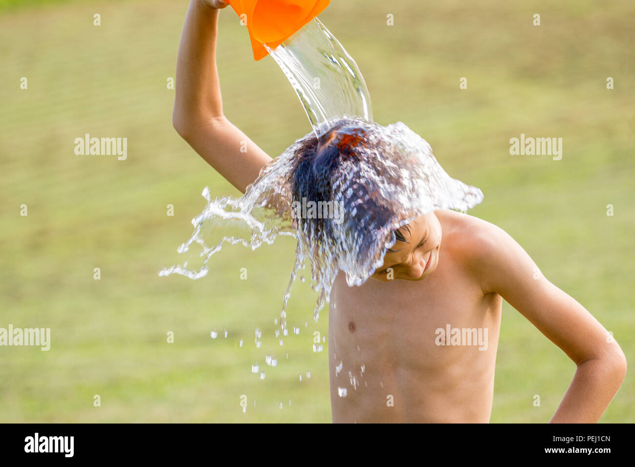 Teen splashing water face hi-res stock photography and images - Alamy