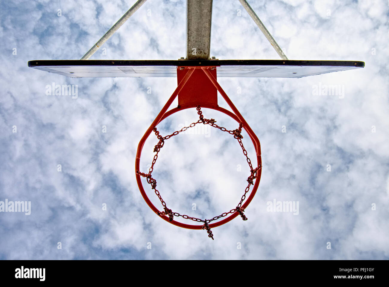 Basketball hoop on a blue sky background Stock Photo - Alamy