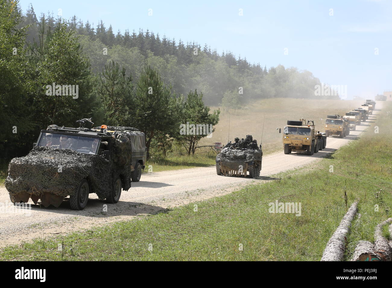 U.S. and German forces conduct a resupply convoy during exercise Swift ...