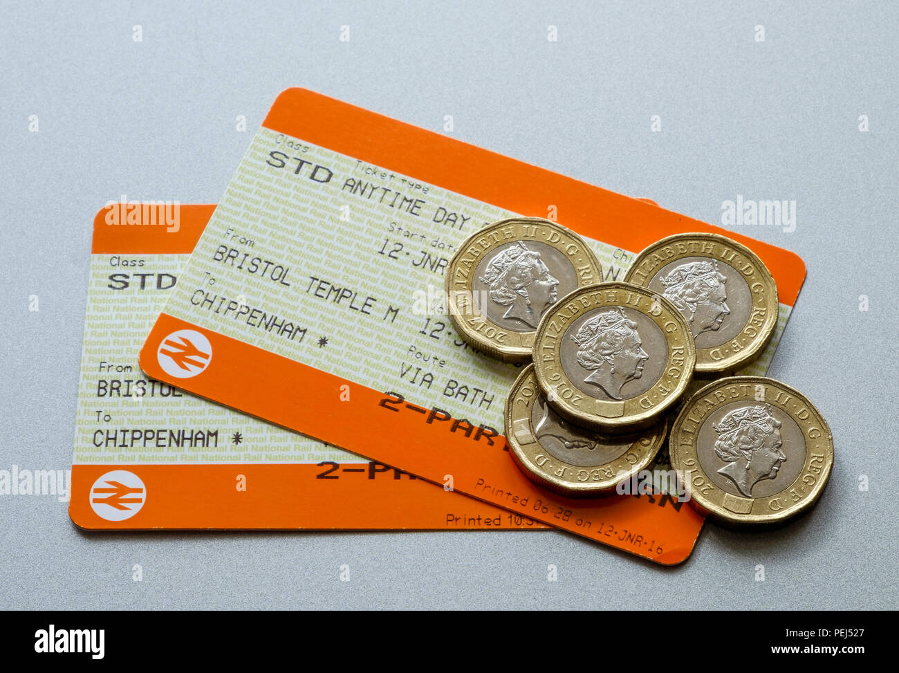 Uk british pound coins train ticket tickets hi-res stock photography ...