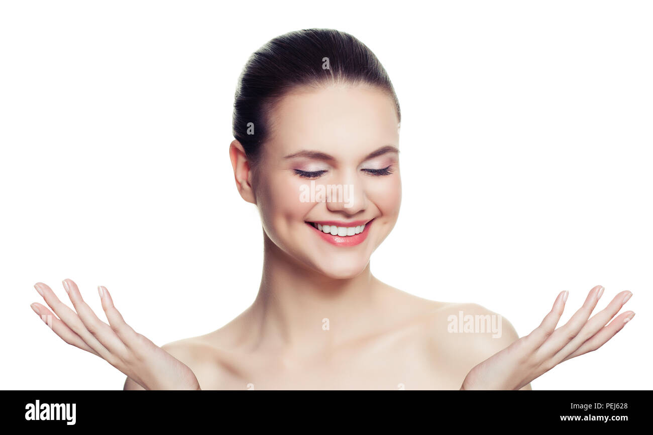 Attractive woman showing empty copy space on the two open hands ...