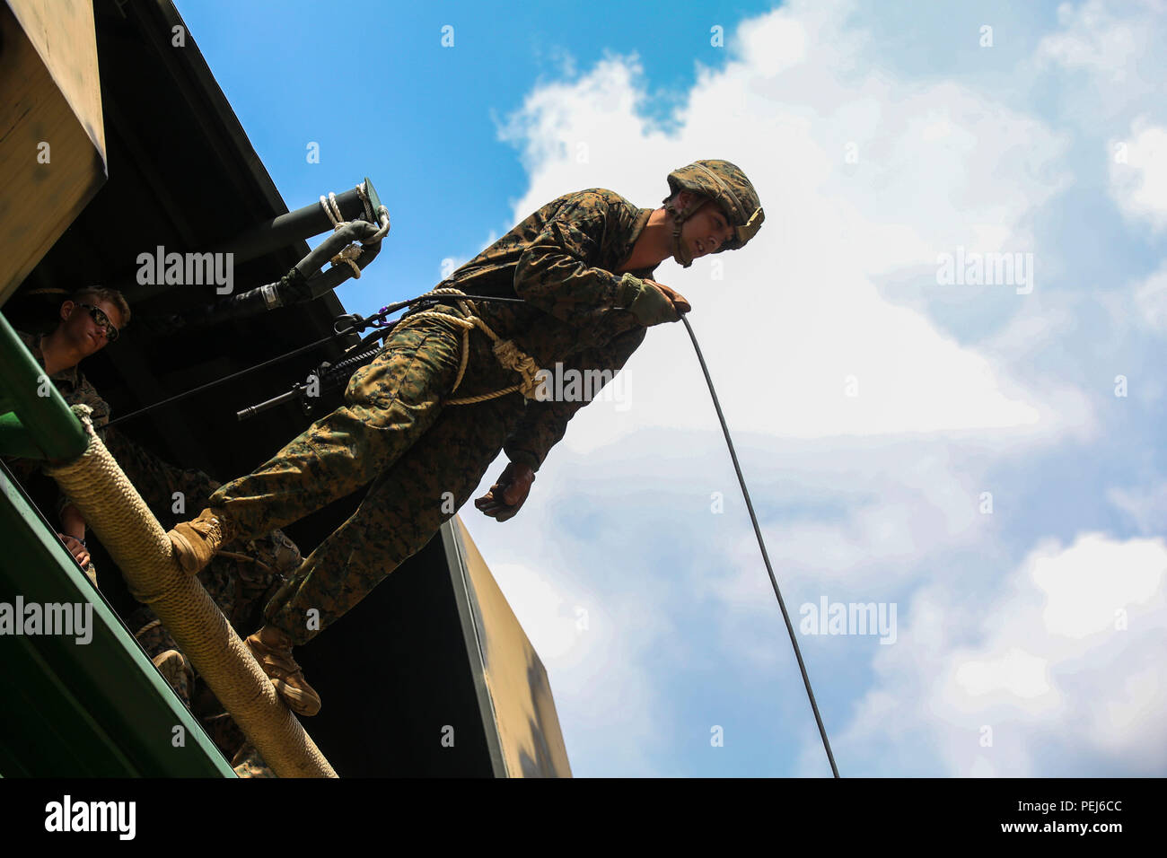 Lance Cpl. Nicolas A. Cotton “Aussie” rappels off a Republic of Korea ...