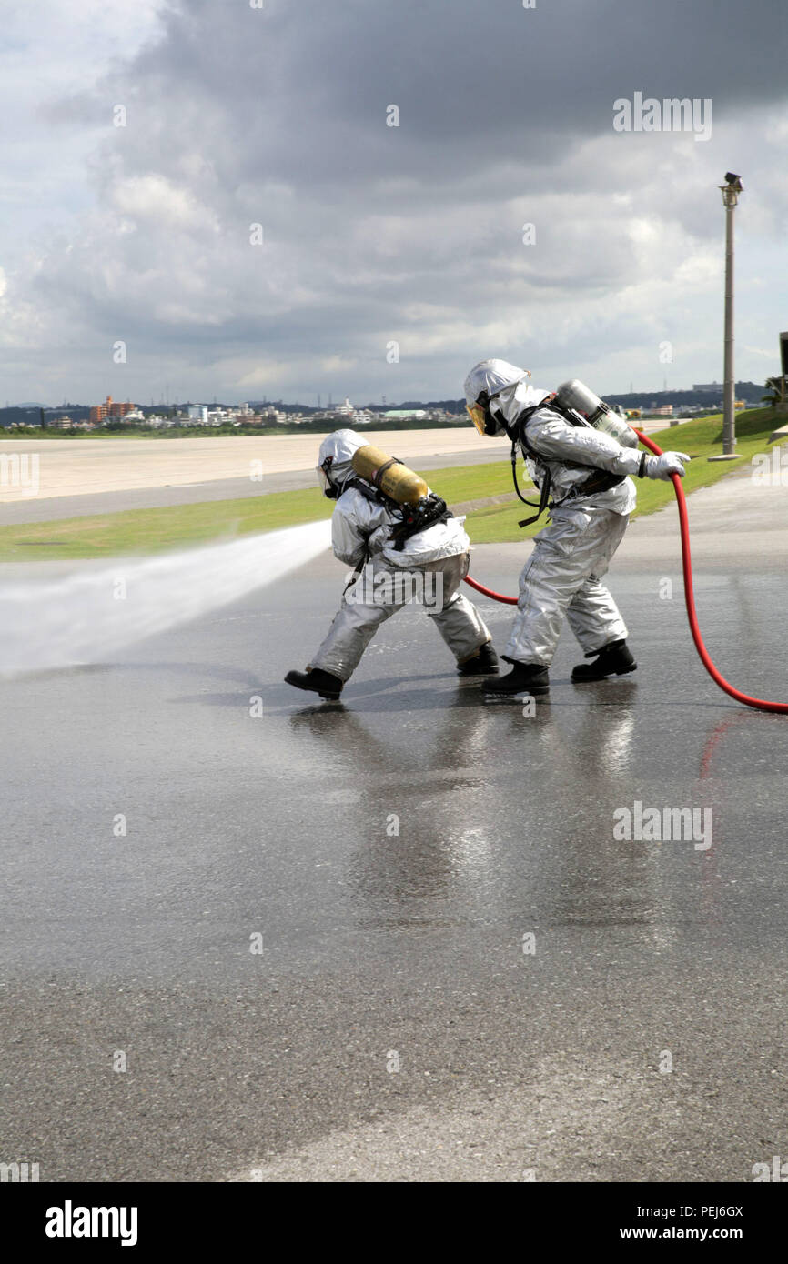 Marines with Aircraft Rescue and Fire Fighting, Headquarters and ...