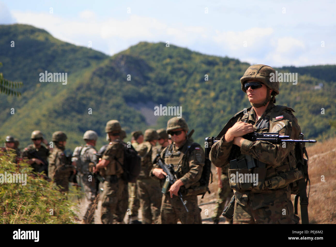 Polish Army soldiers serving as part of NATO's Kosovo Force peace ...