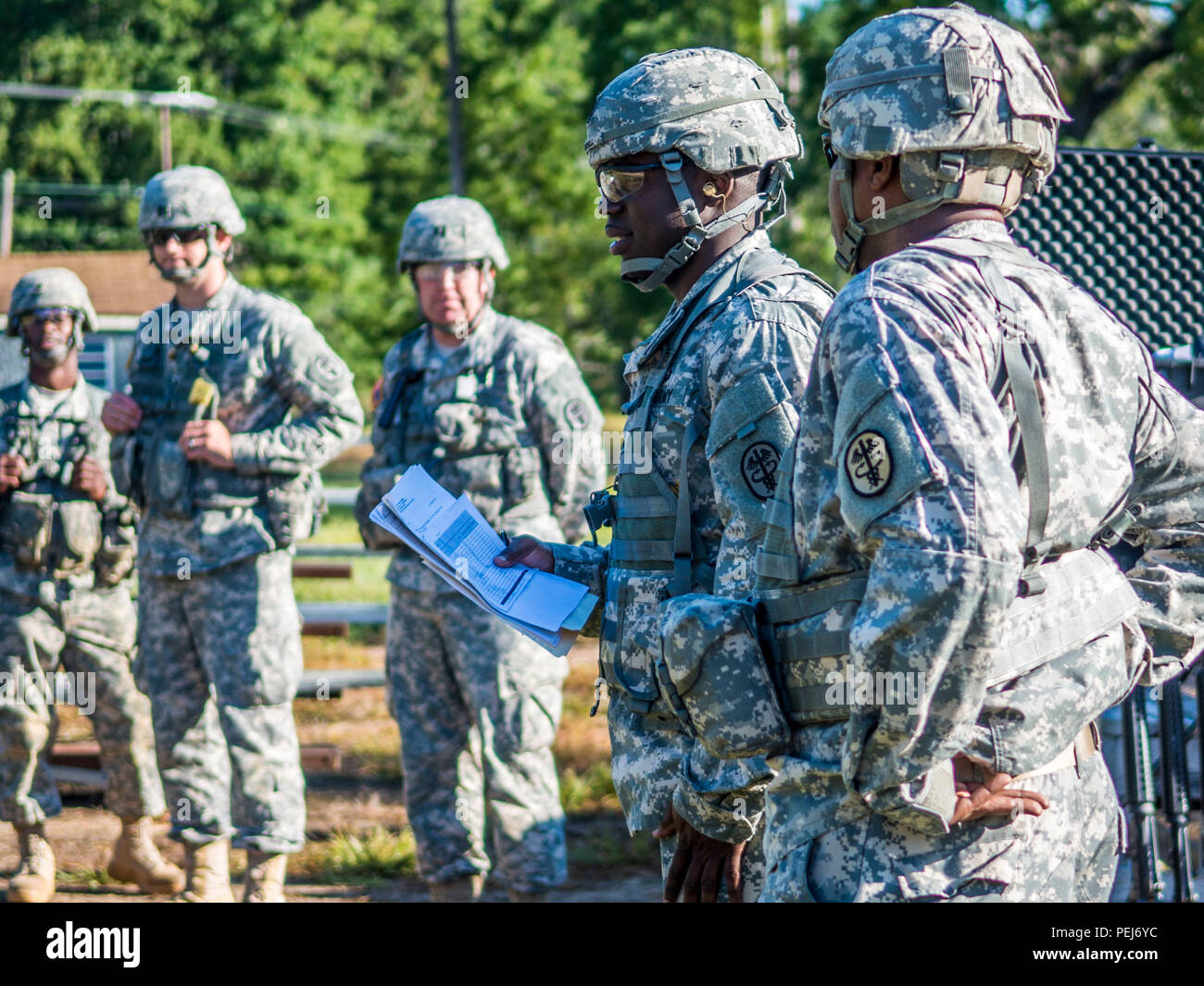 Army Public Health Center First Sargent James Mitchell briefs the ...
