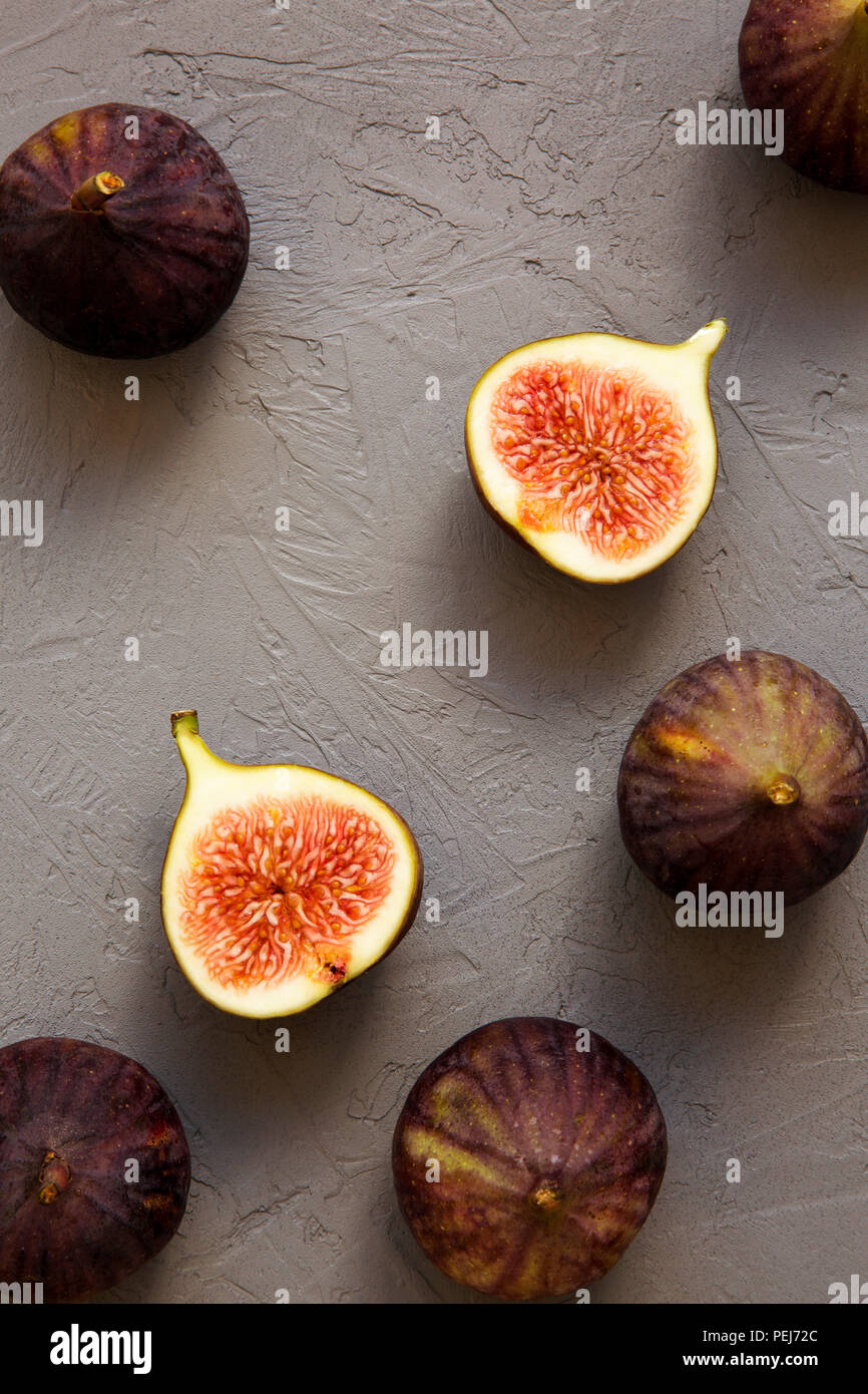 Fresh figs on gray background, top view. Overhead, from above, top view ...