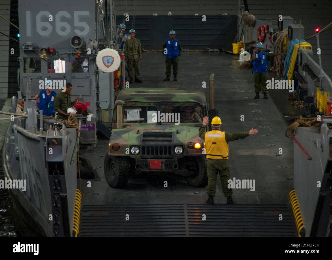 CAMP PENDLETON, Calif. (Dec. 4, 2015) - Sailors and Marines conduct a ...