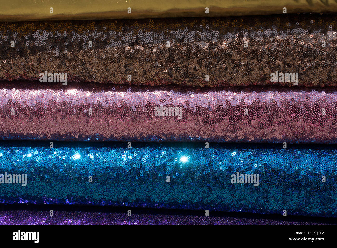 Examples of bright fabric of various color in view Stock Photo - Alamy