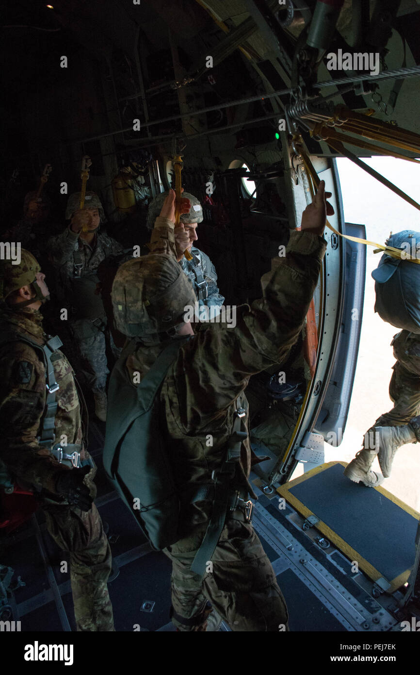 U.S. Army paratroopers from 82nd Airborne Division exit a C-130 ...