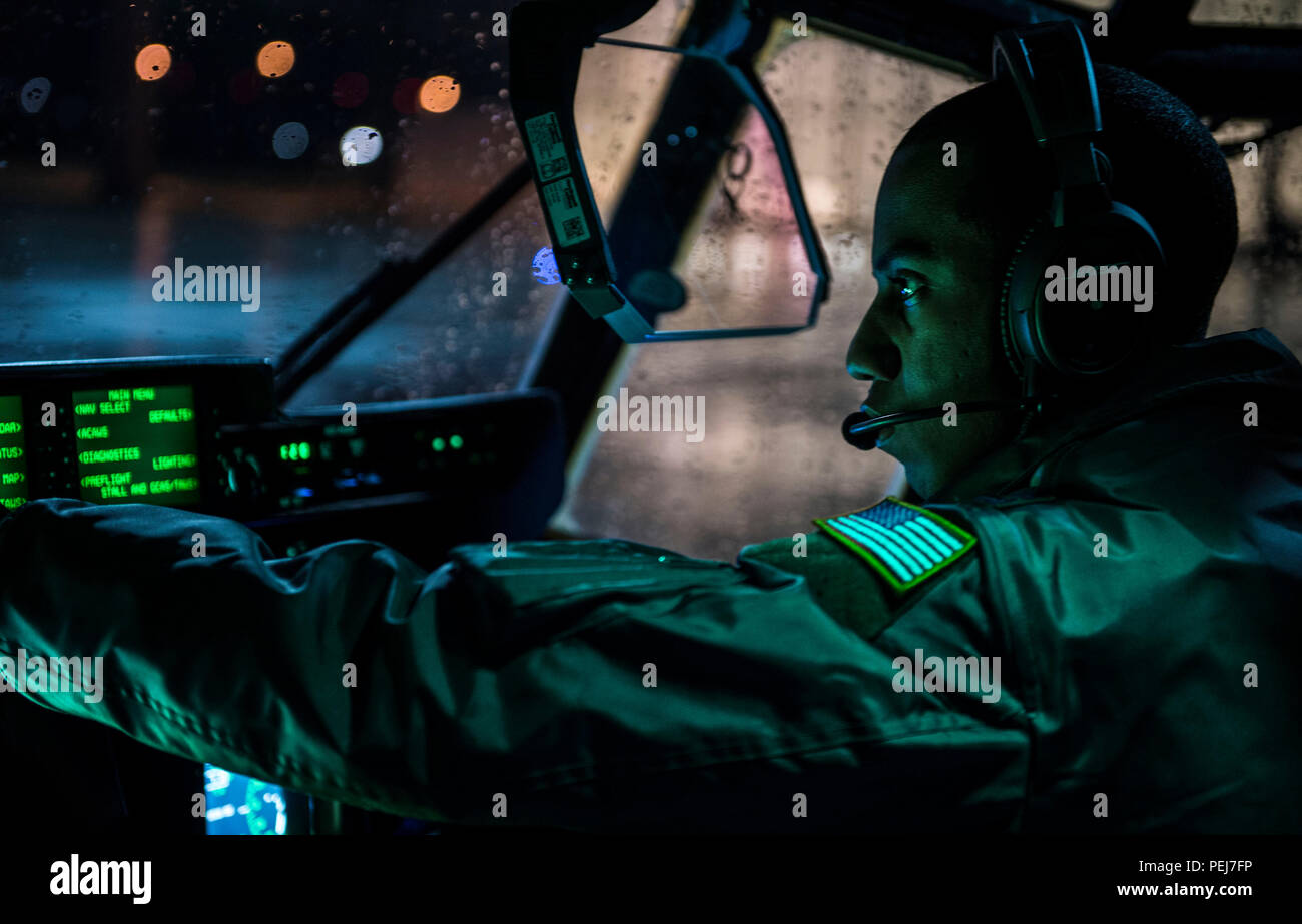 Capt. Chris Scott, 37th Airlift Squadron pilot, prepares for a flight ...