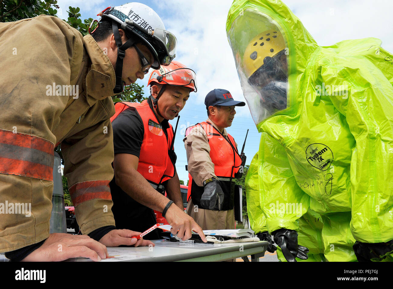 Yuji Nakayama, 18th Civil Engineer Squadron district chief, provides ...
