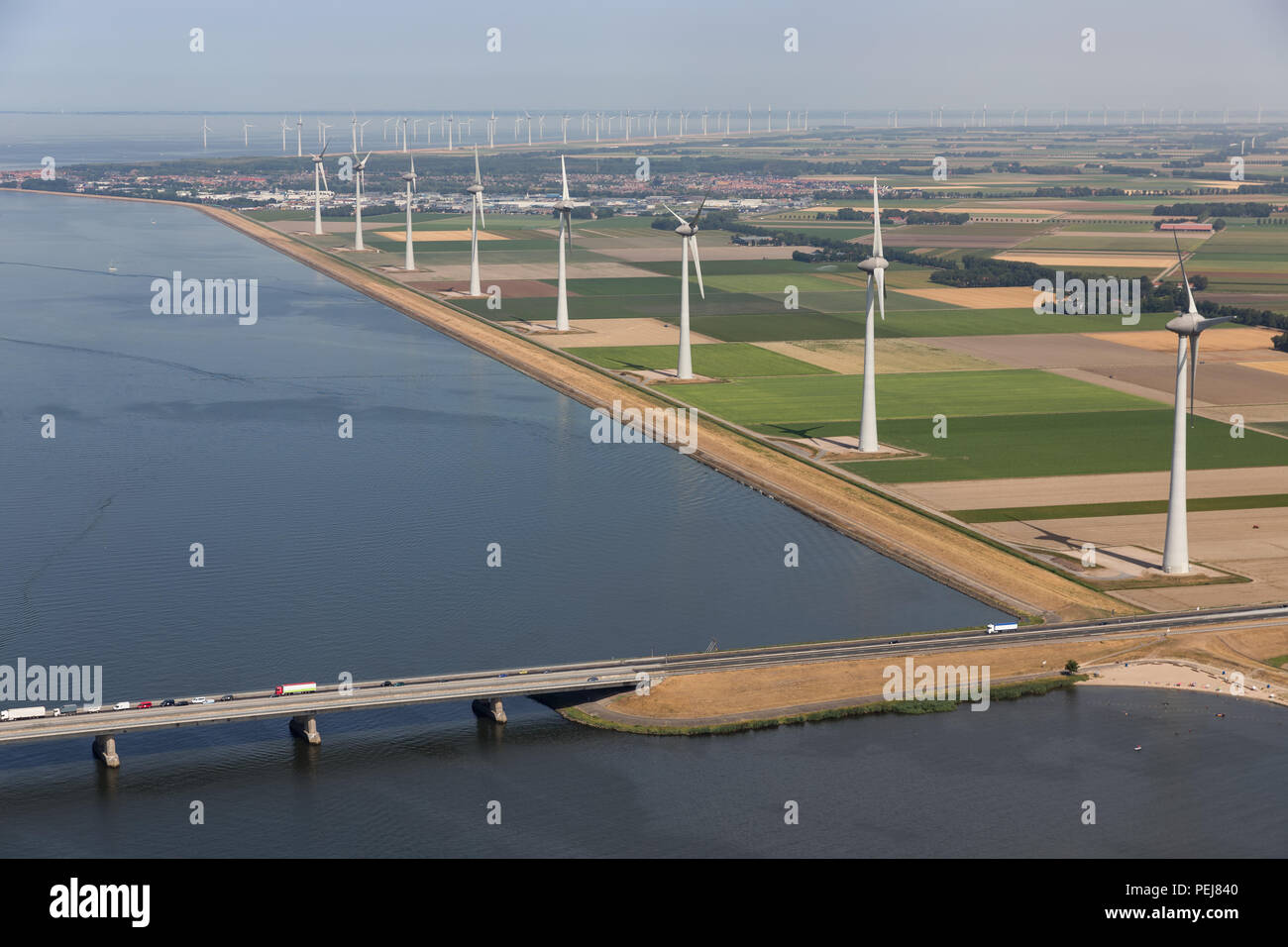 Aerial view Dutch landscape with bridge and wind turbines Stock Photo ...