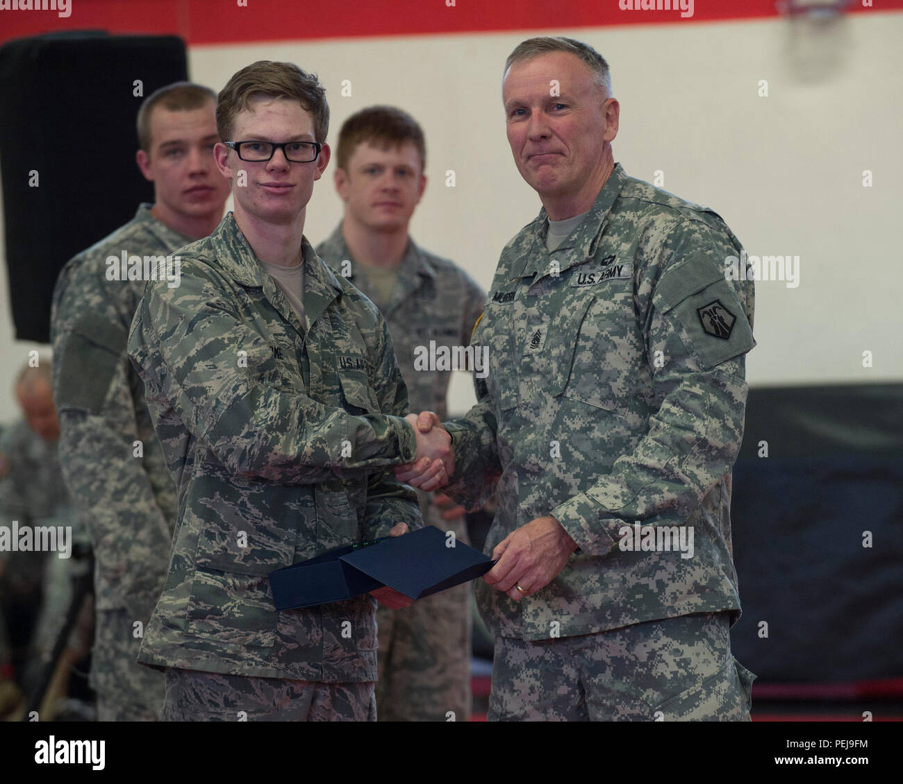 U.S. Army Command Sergeant Maj. (CSM) James Murrin (right), 7th MSC CSM ...