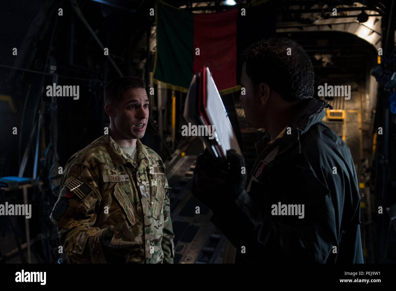 U.S. Air Force Tech. Sgt. Nathan Raab instructs an Afghan Air Force ...