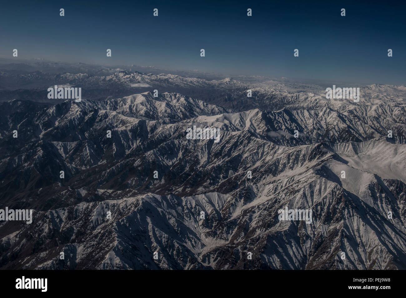Mountains are covered with snow near Forward Operating Base Oqab, Kabul ...