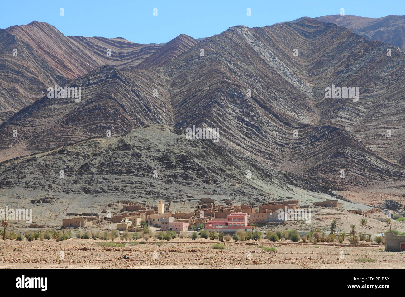 Moroccan village nestled beneath the Anti Atlas mountains Stock Photo ...